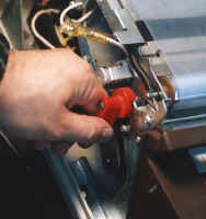 To open, first rotate red knob